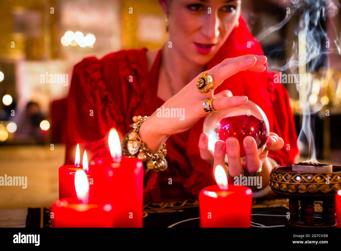 Fortuneteller or esoteric Oracle, sees in the future by looking into ...