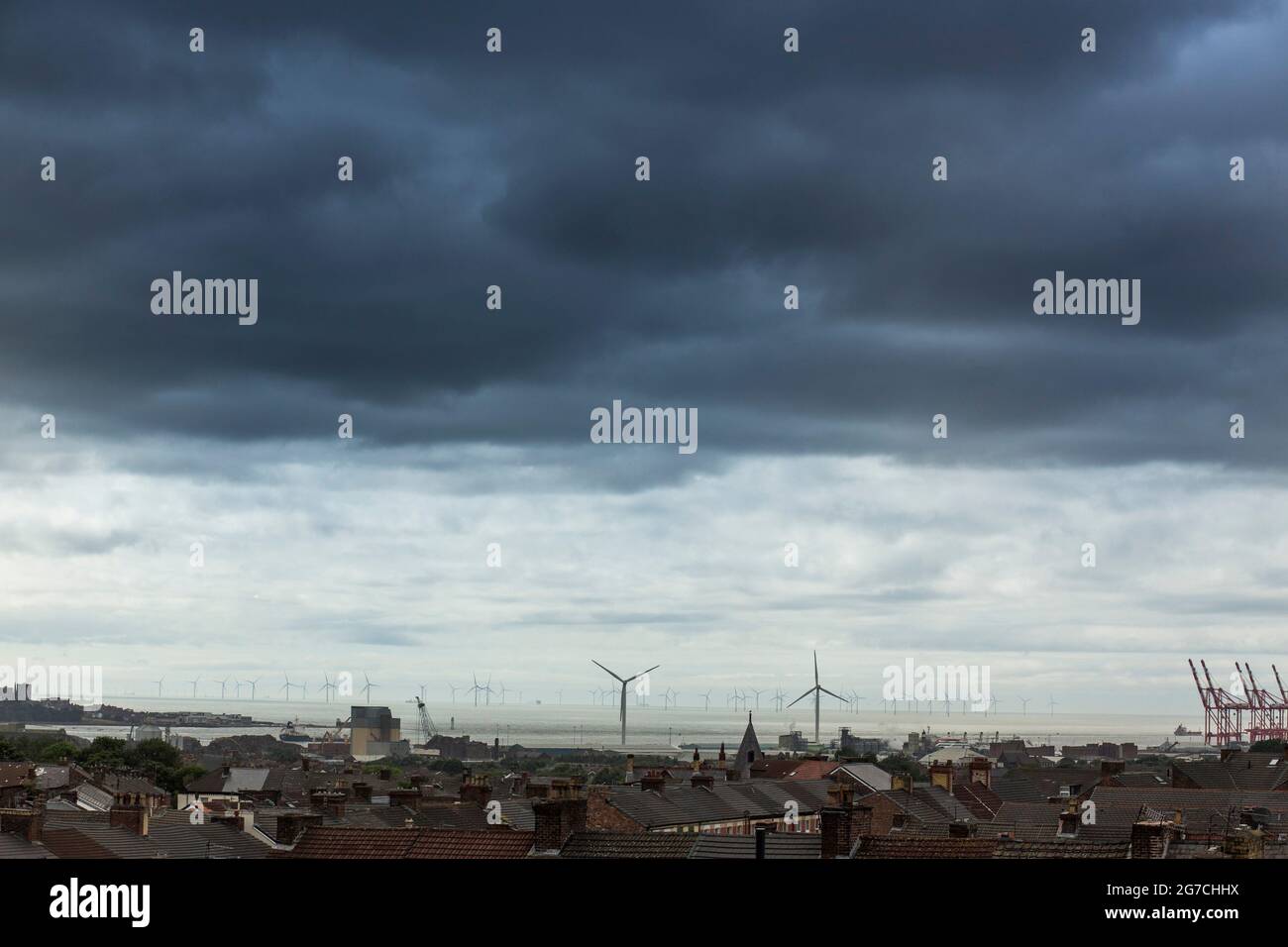 Windmills in the Mersey estuary viewed from Anfield stadium the home of ...