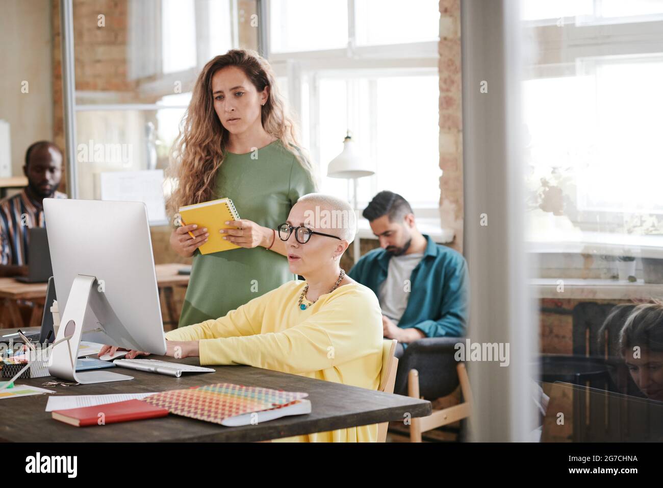 Businesswomen working together in hi-res stock photography and images ...