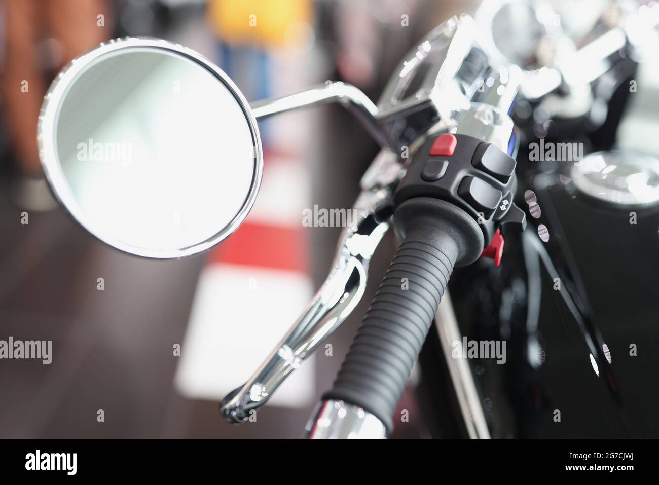 Motorcycle mirror with throttle handle on handlebars closeup Stock ...