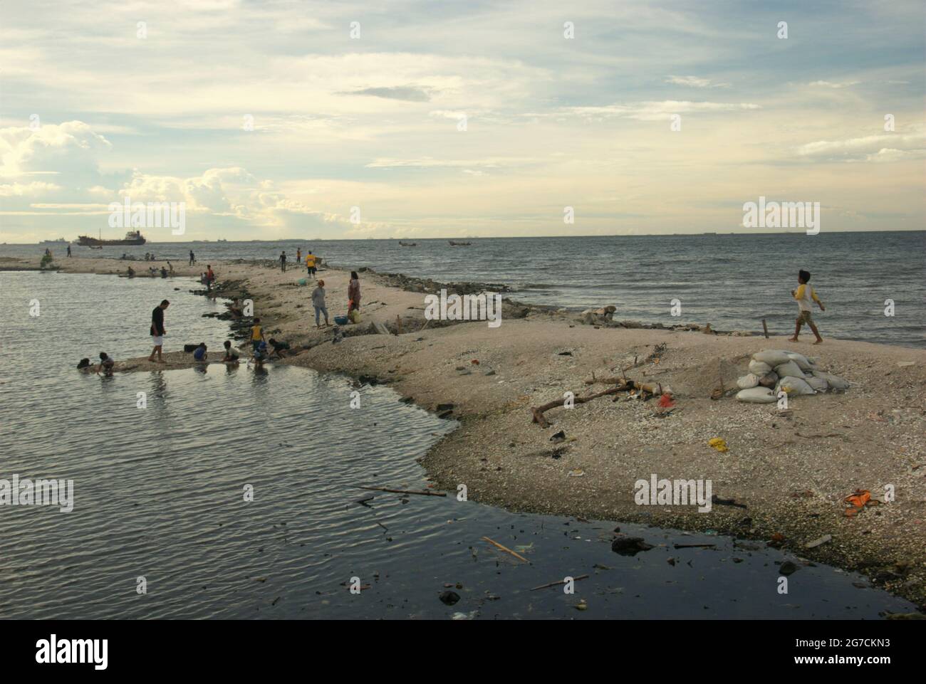 Jakarta, Indonesia. People having recreational time on the beach of ...