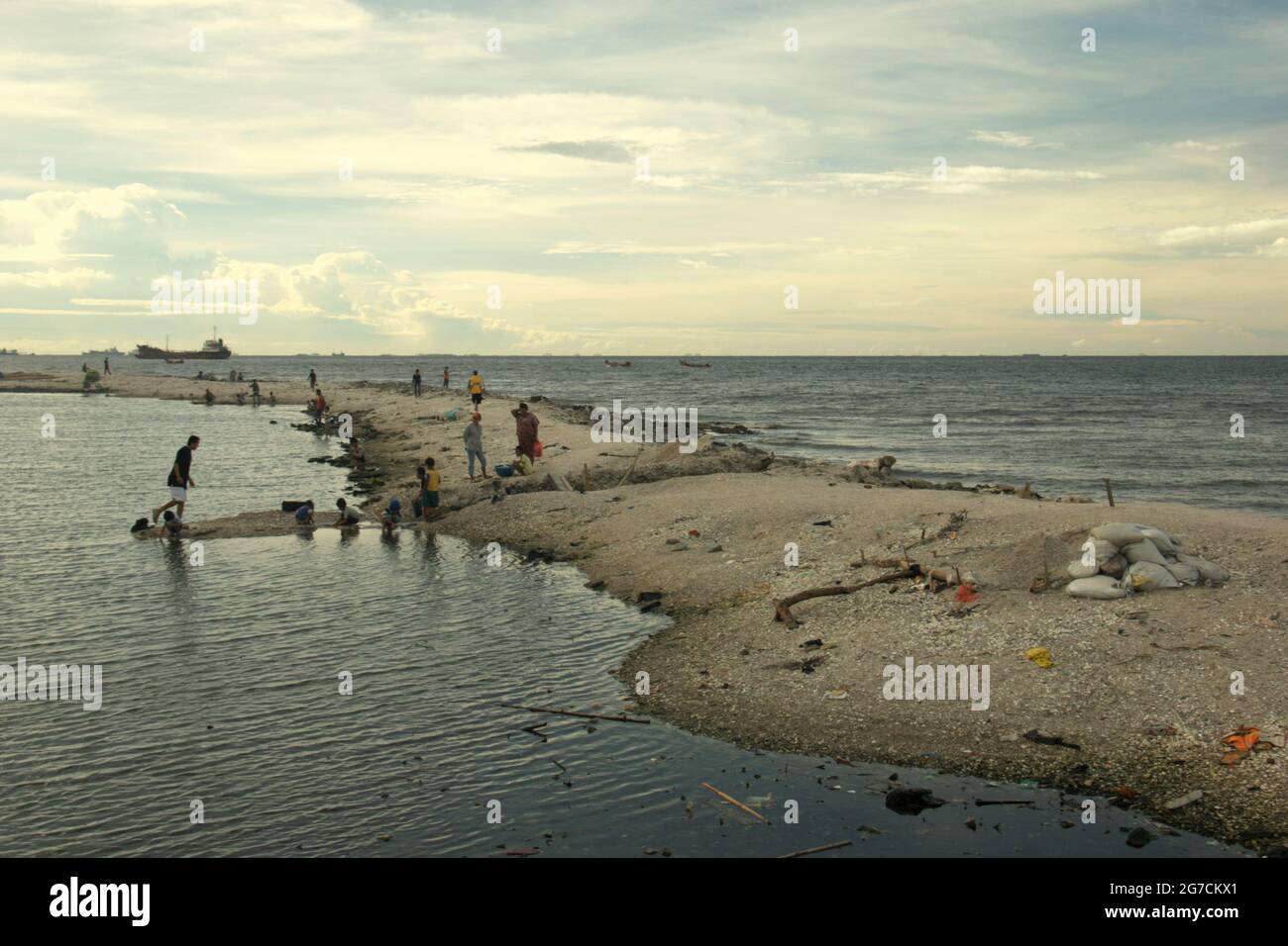 Jakarta, Indonesia. People having recreational time on the beach of ...