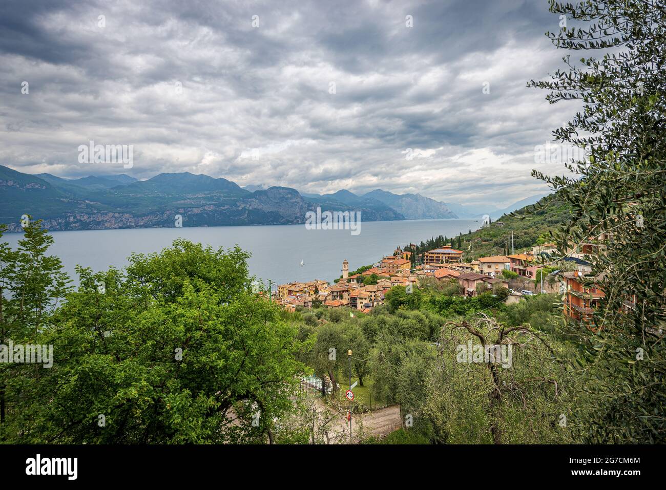 Aerial view of the Lake Garda (Lago di Garda). Small village of ...