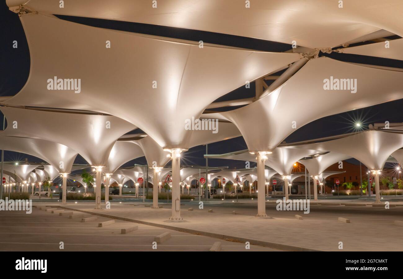 doha,qatar- May 03 2021 : Car park with umbrella to provide shade for ...