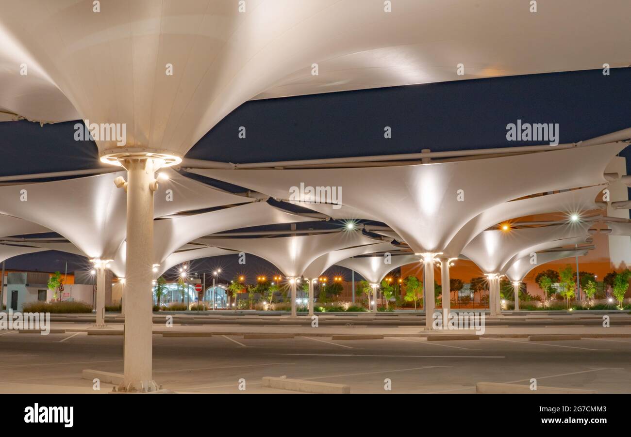 doha,qatar- May 03 2021 : Car park with umbrella to provide shade for ...
