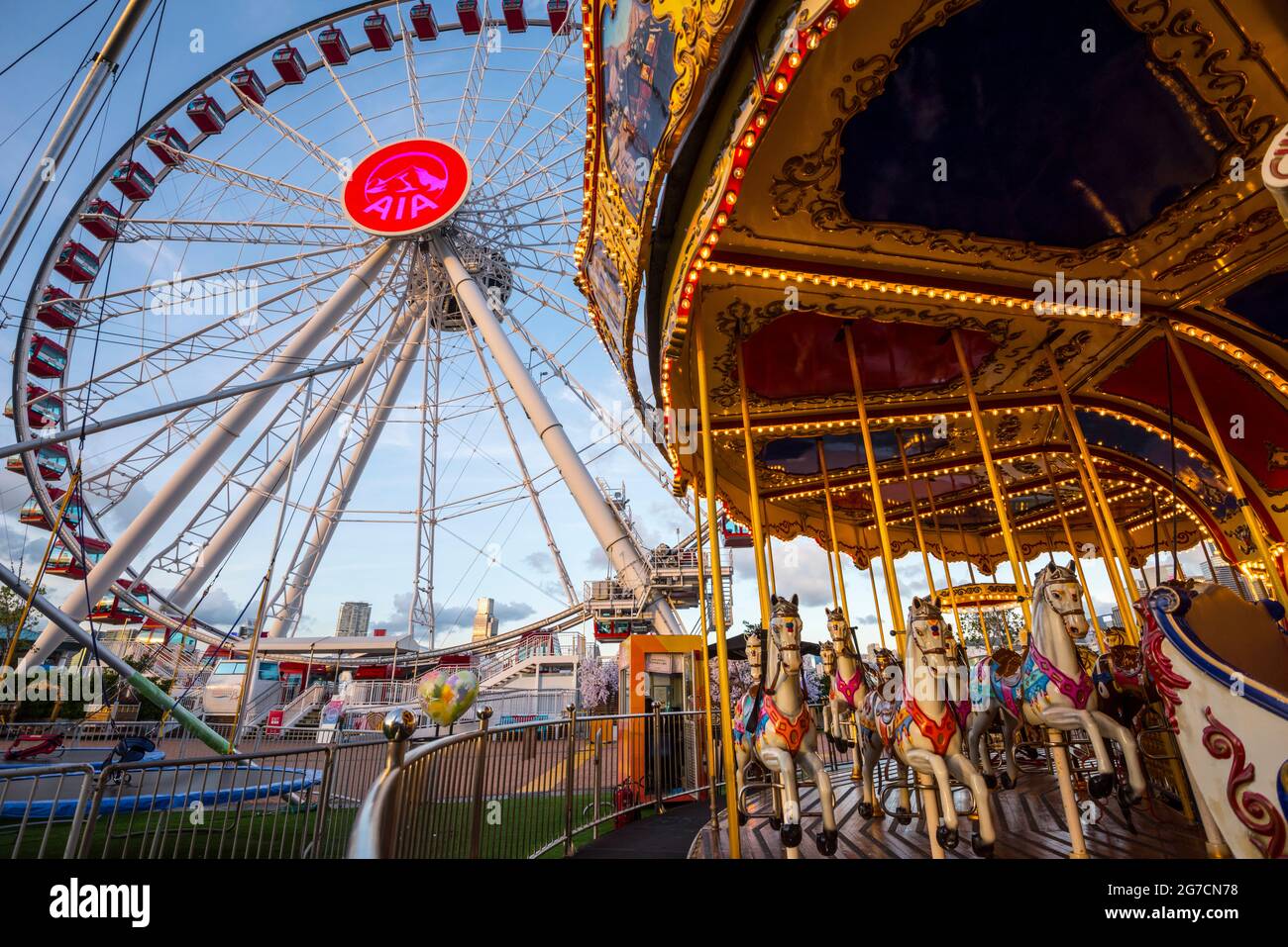 Hong Kong observation wheel and AIA The Great European Carnival, and funfair, Hong Kong, China ...