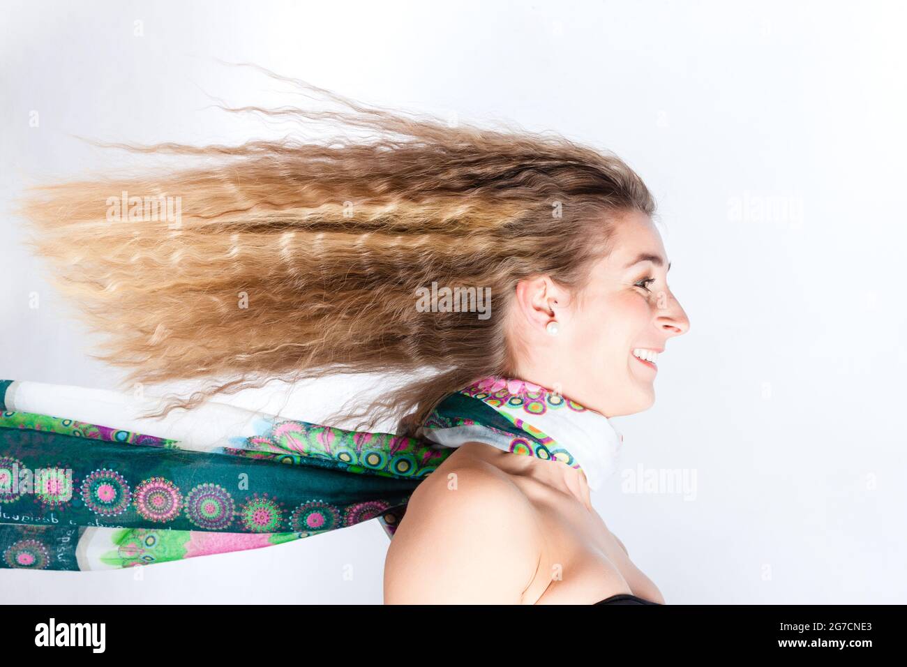 Scarf blowing in wind hi-res stock photography and images - Alamy