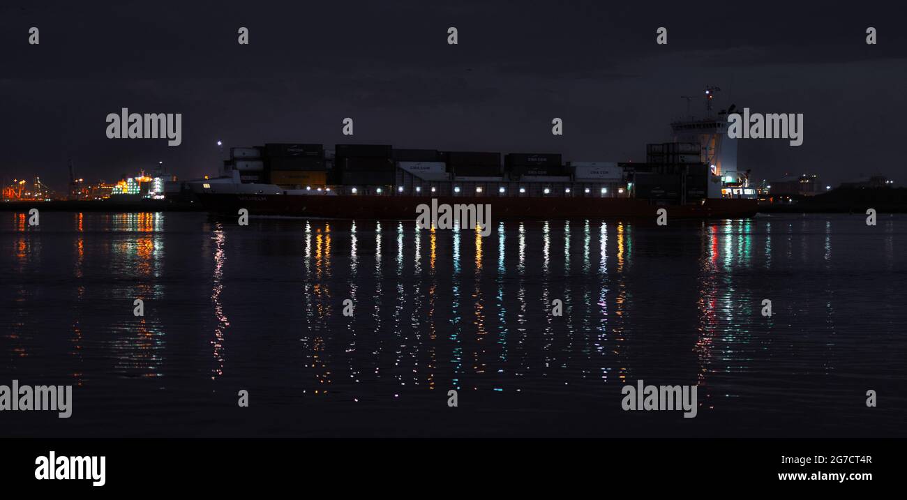 Beautiful photo of a tanker sailing with cargo through the strait at ...