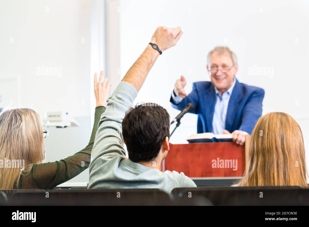 Professor listening to students hi-res stock photography and images - Alamy