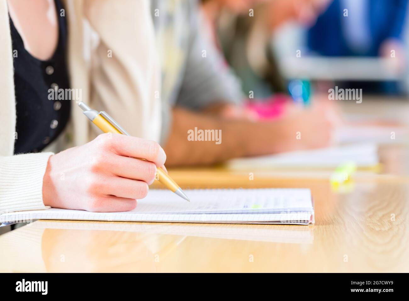 University college students writing test or exam Stock Photo - Alamy