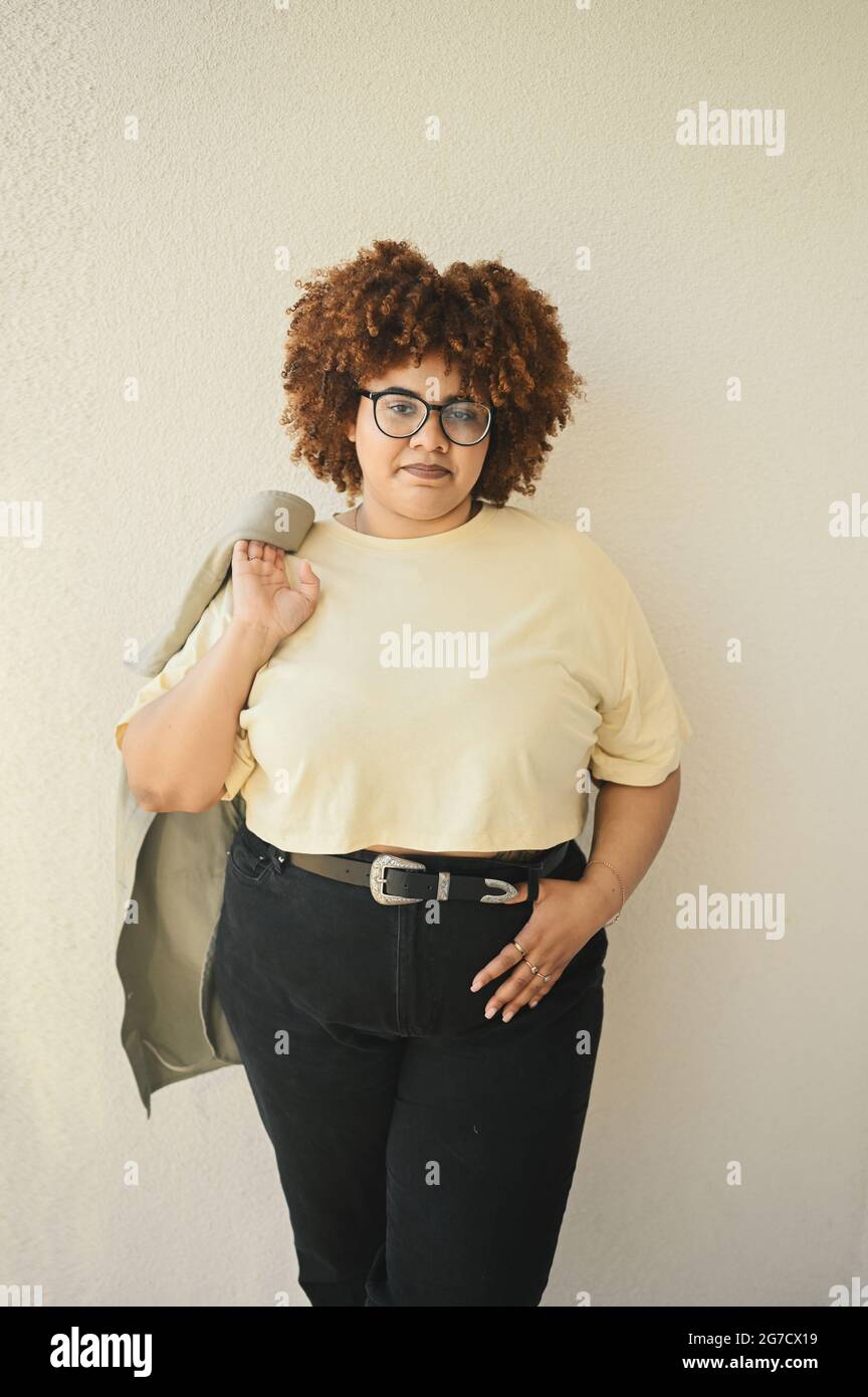 Beautiful happy smiling curvy plus size African black woman afro hair ...