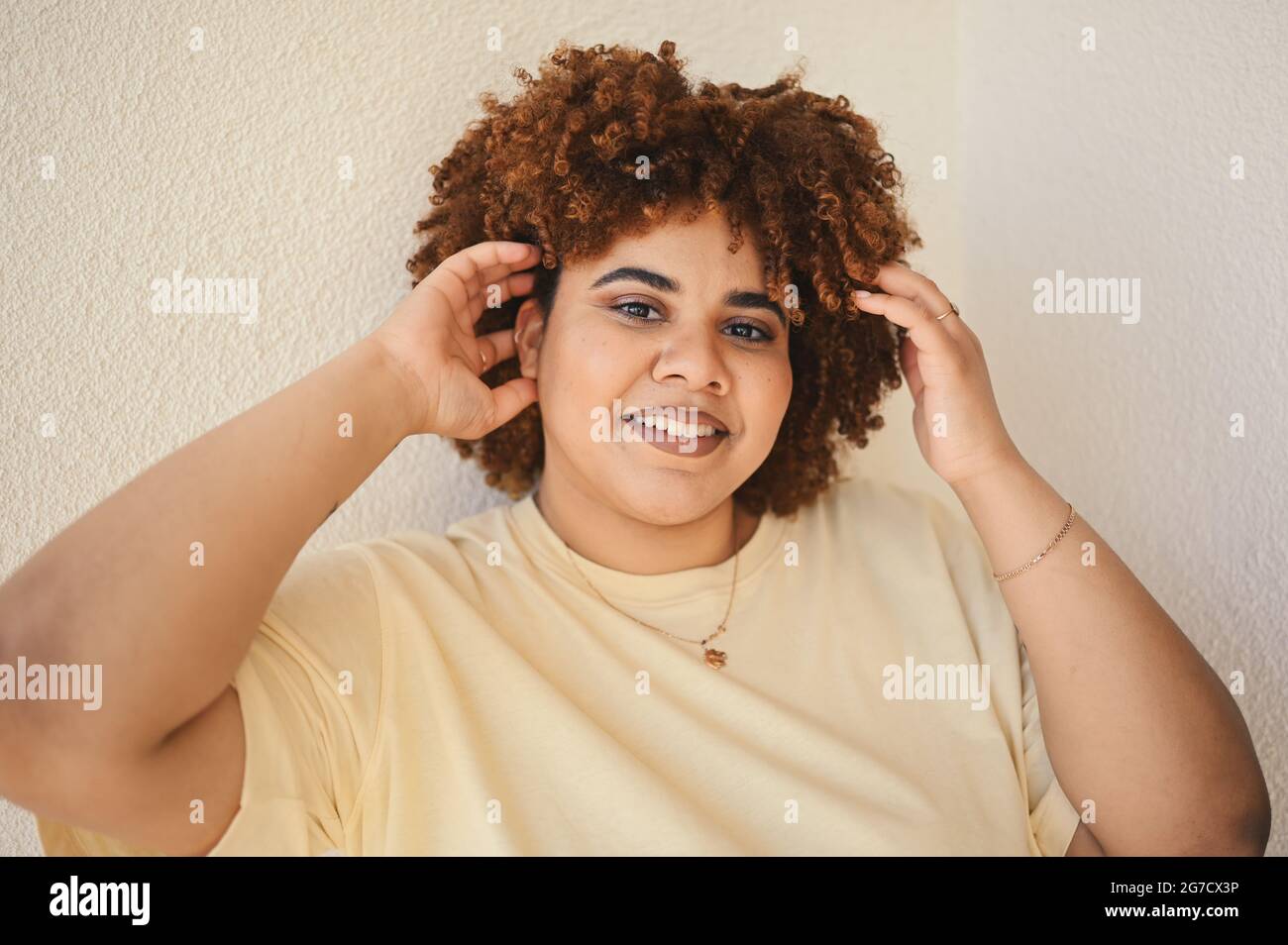 Beautiful happy smiling curvy plus size African black woman afro hair ...