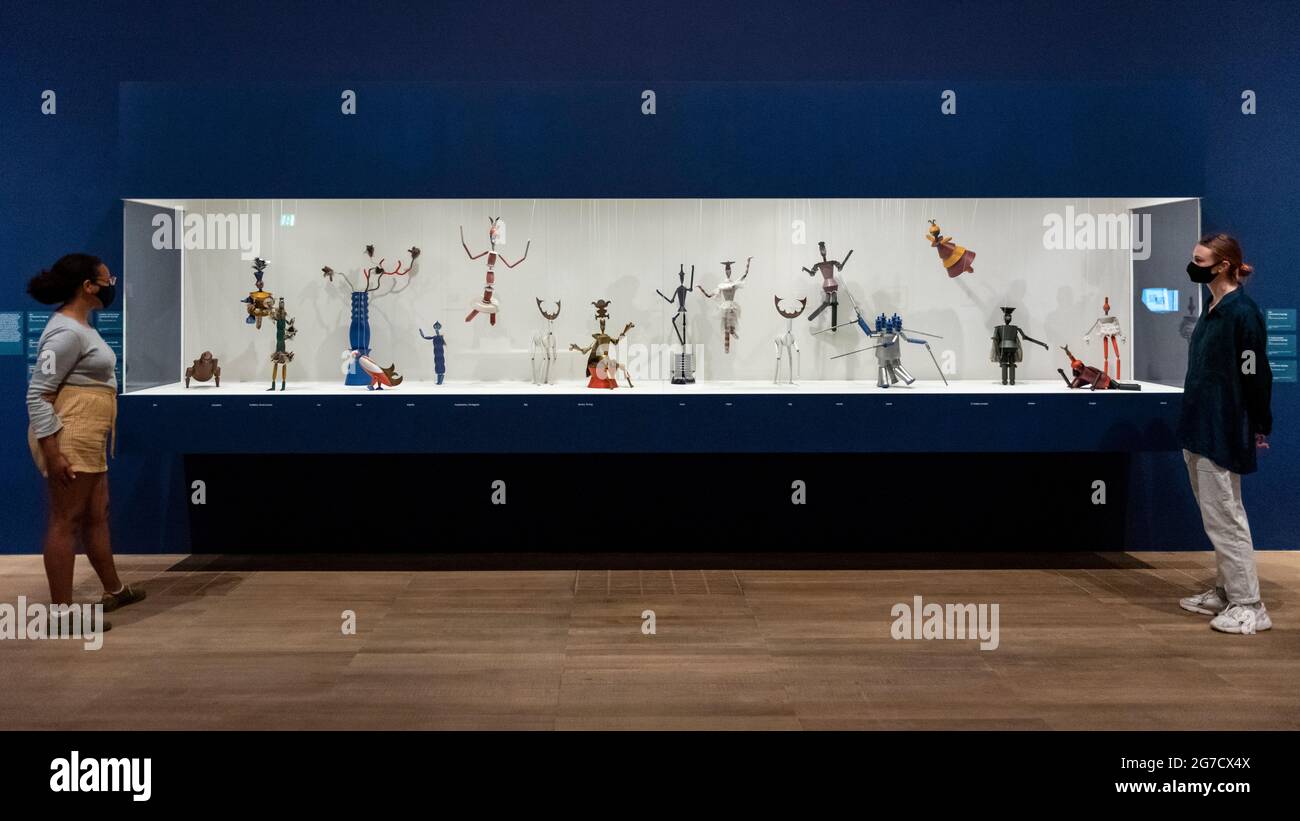 London, UK. 13 July 2021. Staff members view some of the 17 string ...