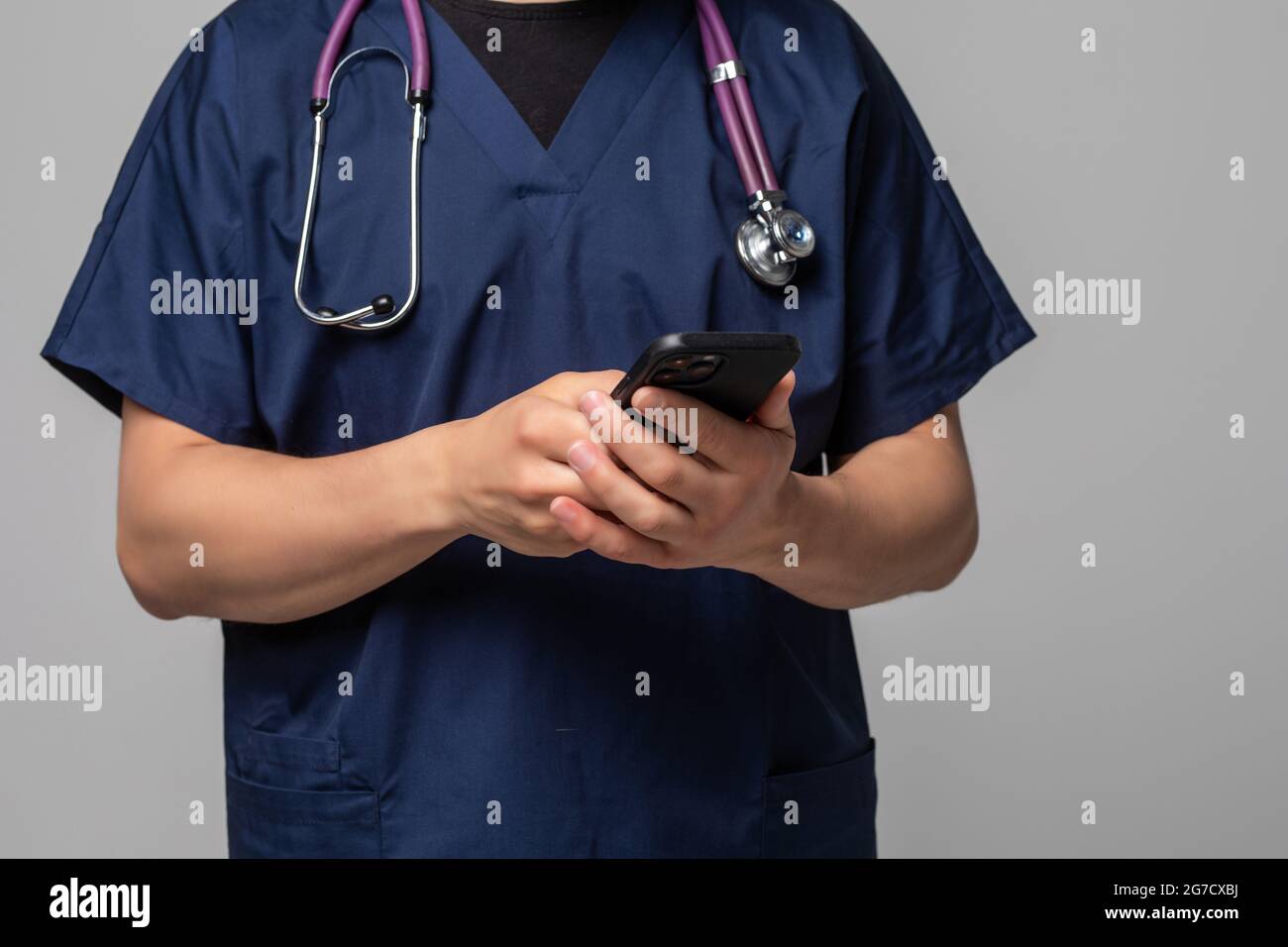 doctor using mobile phone close up view isolated on white background ...