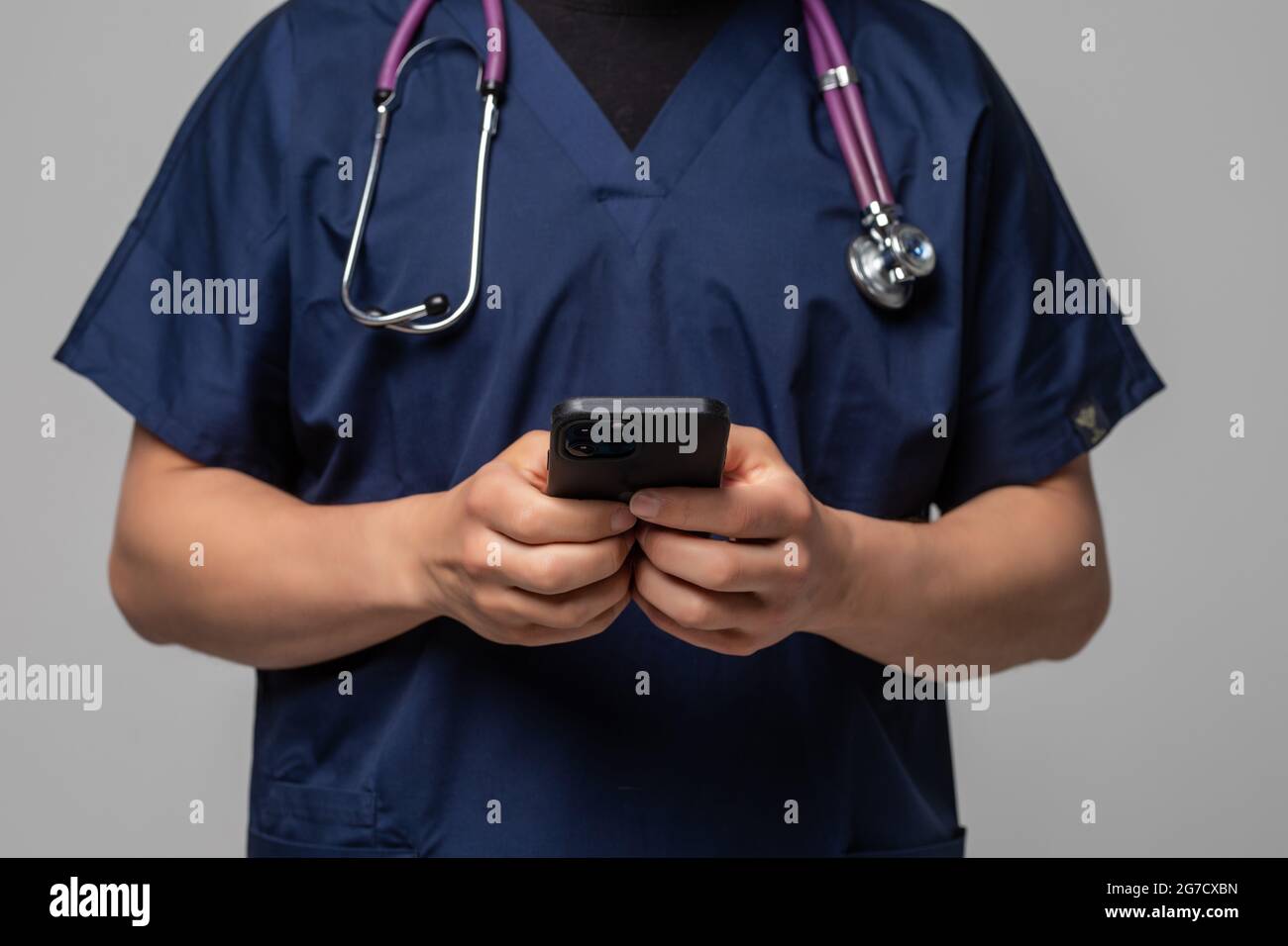doctor using mobile phone close up view isolated on white background ...