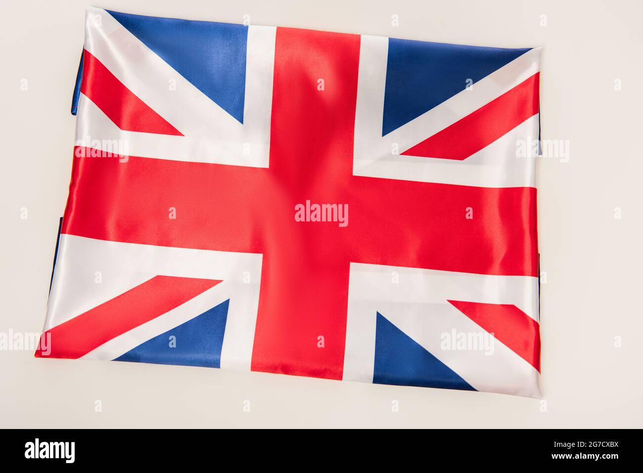 top view of national flag of united kingdom with red cross isolated on ...