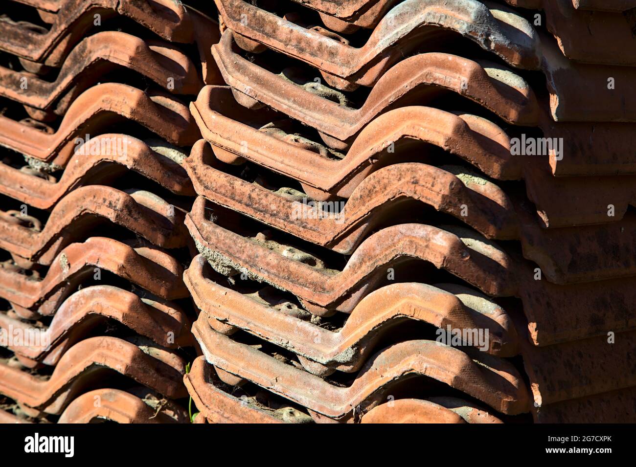 Roof tiles stacked up Stock Photo - Alamy