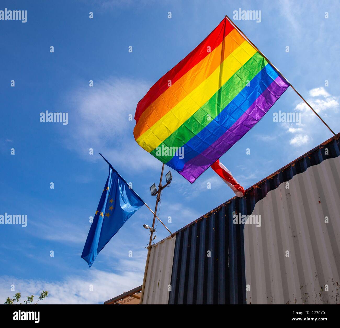 Rainbow LGBT flags against blue sky on a sunny day. Poznan. Poland ...