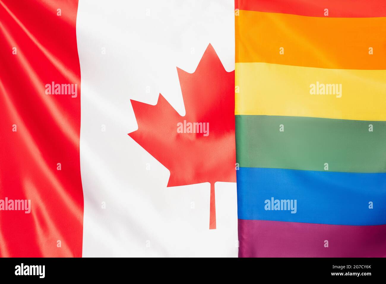 close up of canadian and lgbt flags, equality rights concept Stock ...