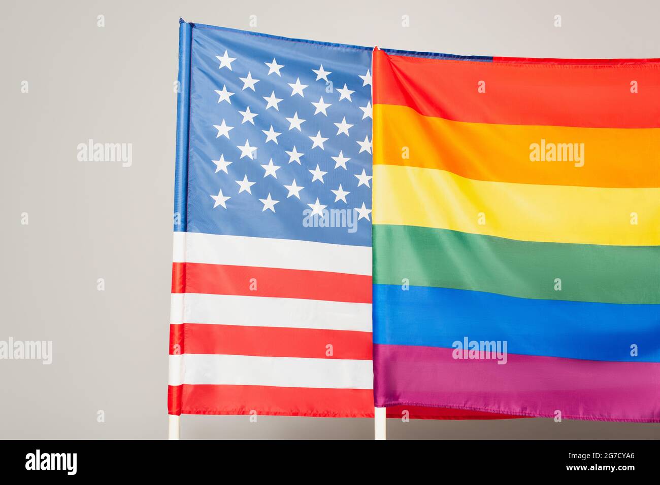 american and lgbt flags isolated on grey, equality rights concept Stock ...