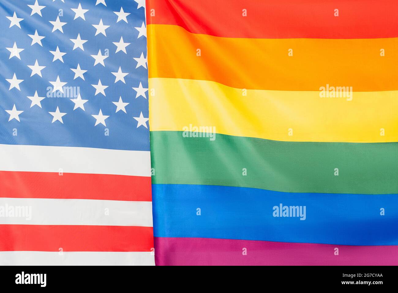 close up of american and lgbt flags, equality rights concept Stock ...
