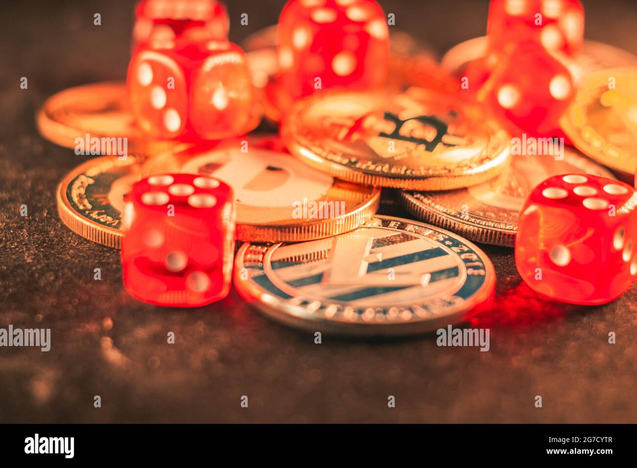 Pile of red dices and gold coins Stock Photo - Alamy