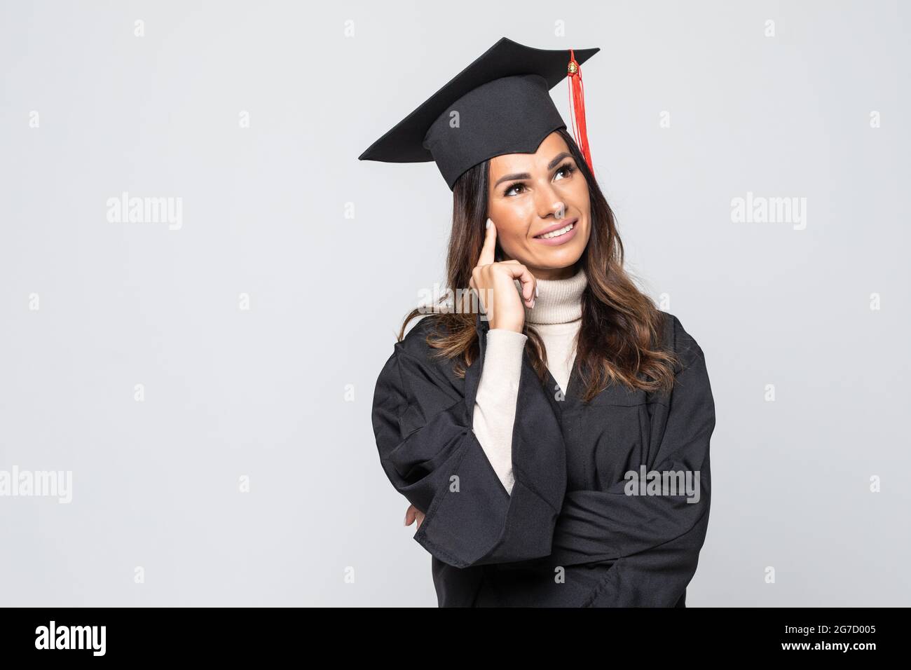 Young graduation woman isolated on white background Stock Photo - Alamy