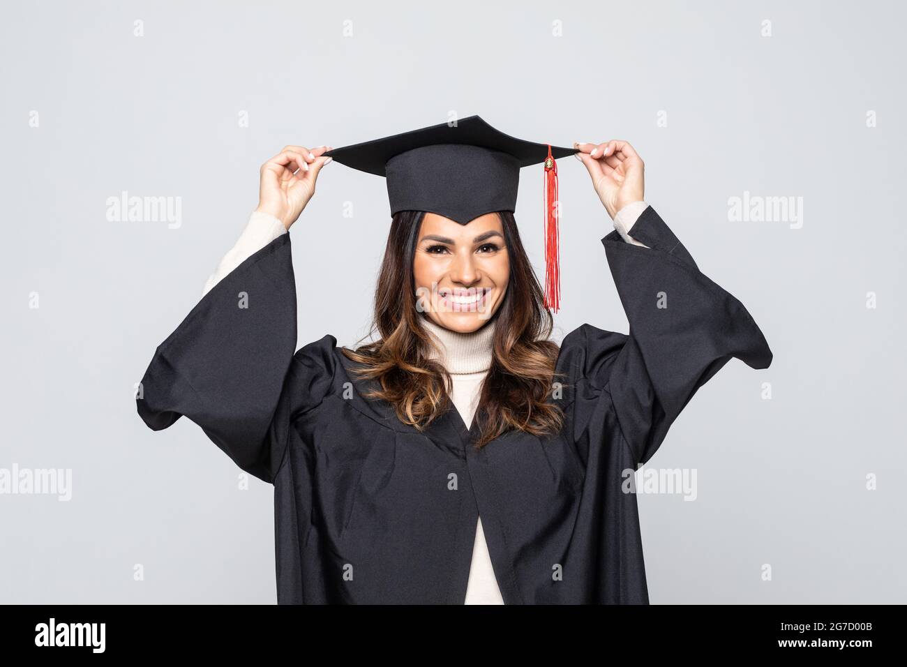 Young graduation woman isolated on white background Stock Photo - Alamy