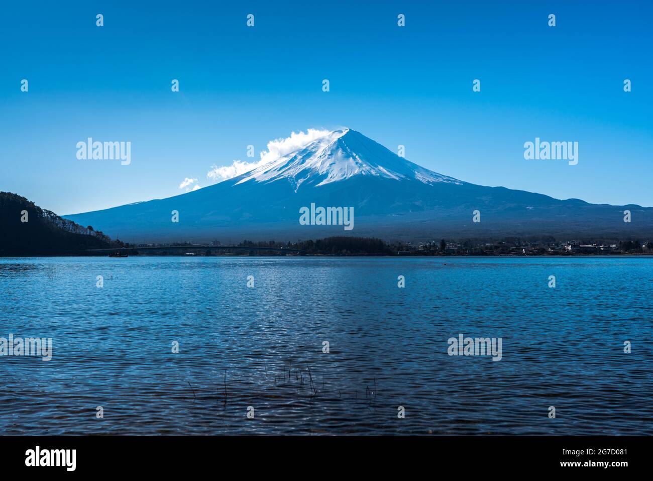 Mount Fuji from Lake Kawaguchiko in Japan. Clouds across the snow ...
