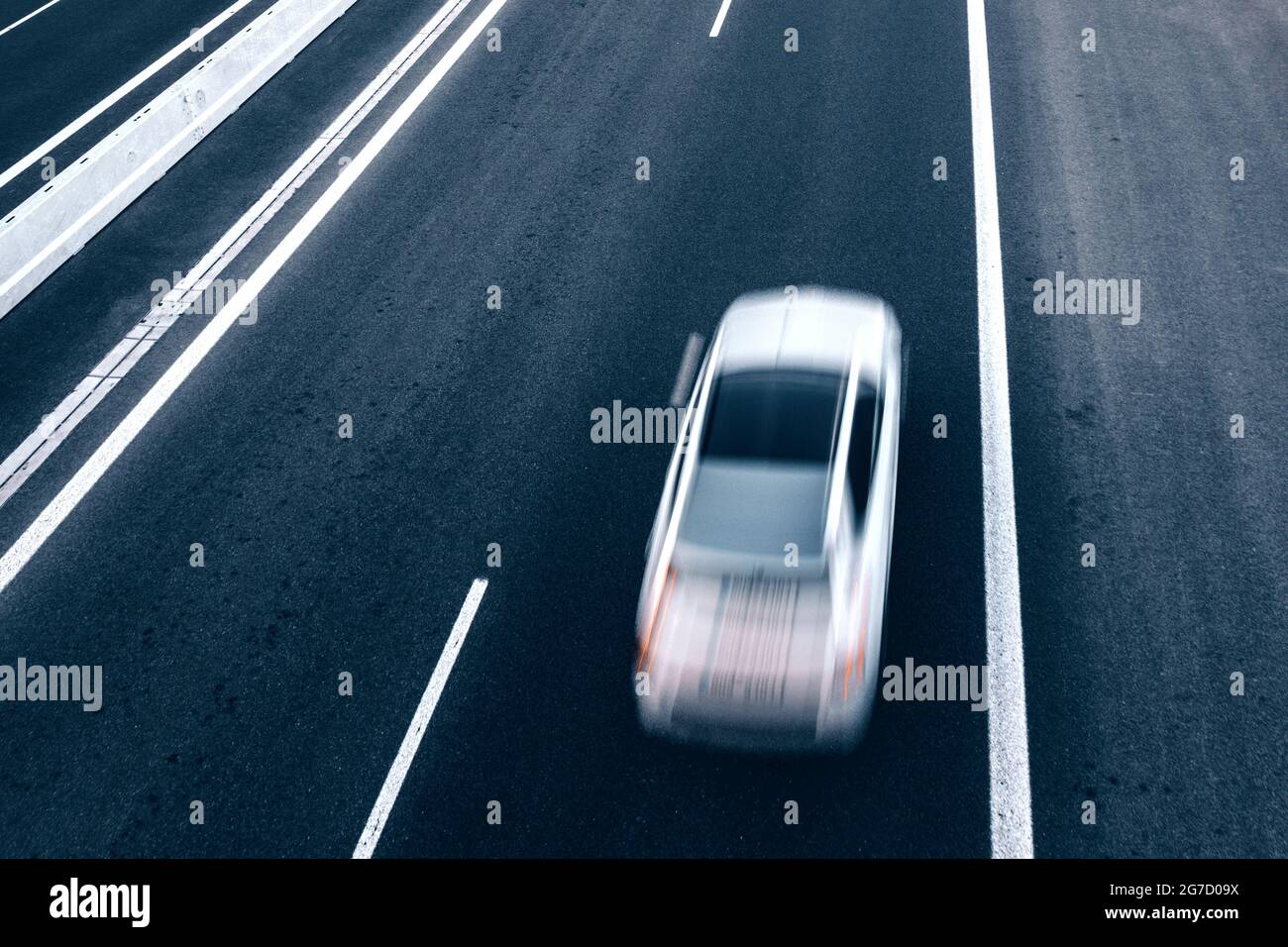Fast moving blurry cars driving on the highway. European highway ...