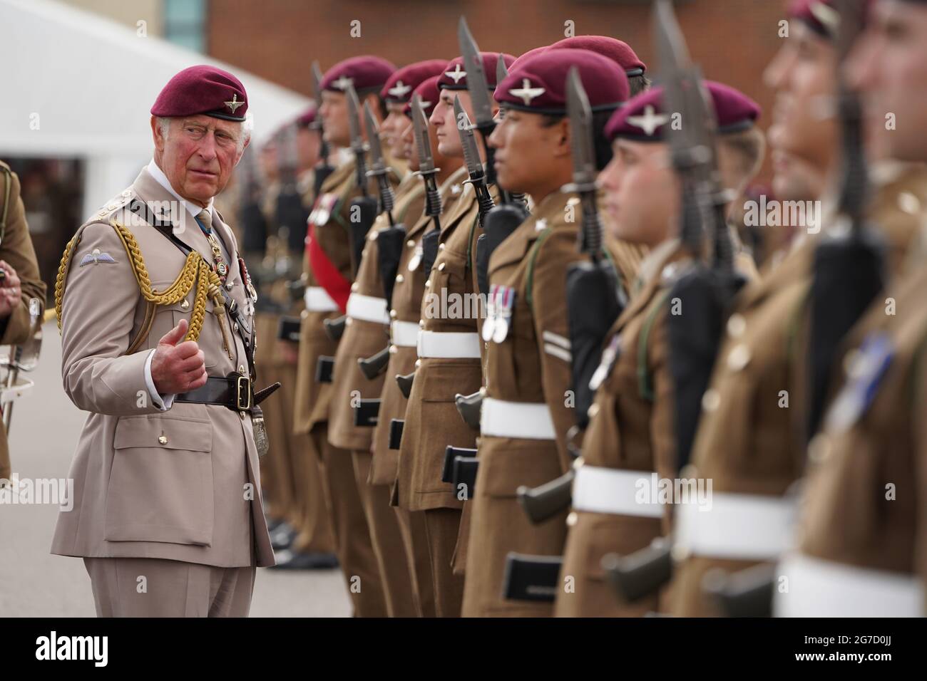 The Prince of Wales, Colonel on Chief, inspects the front rank of ...