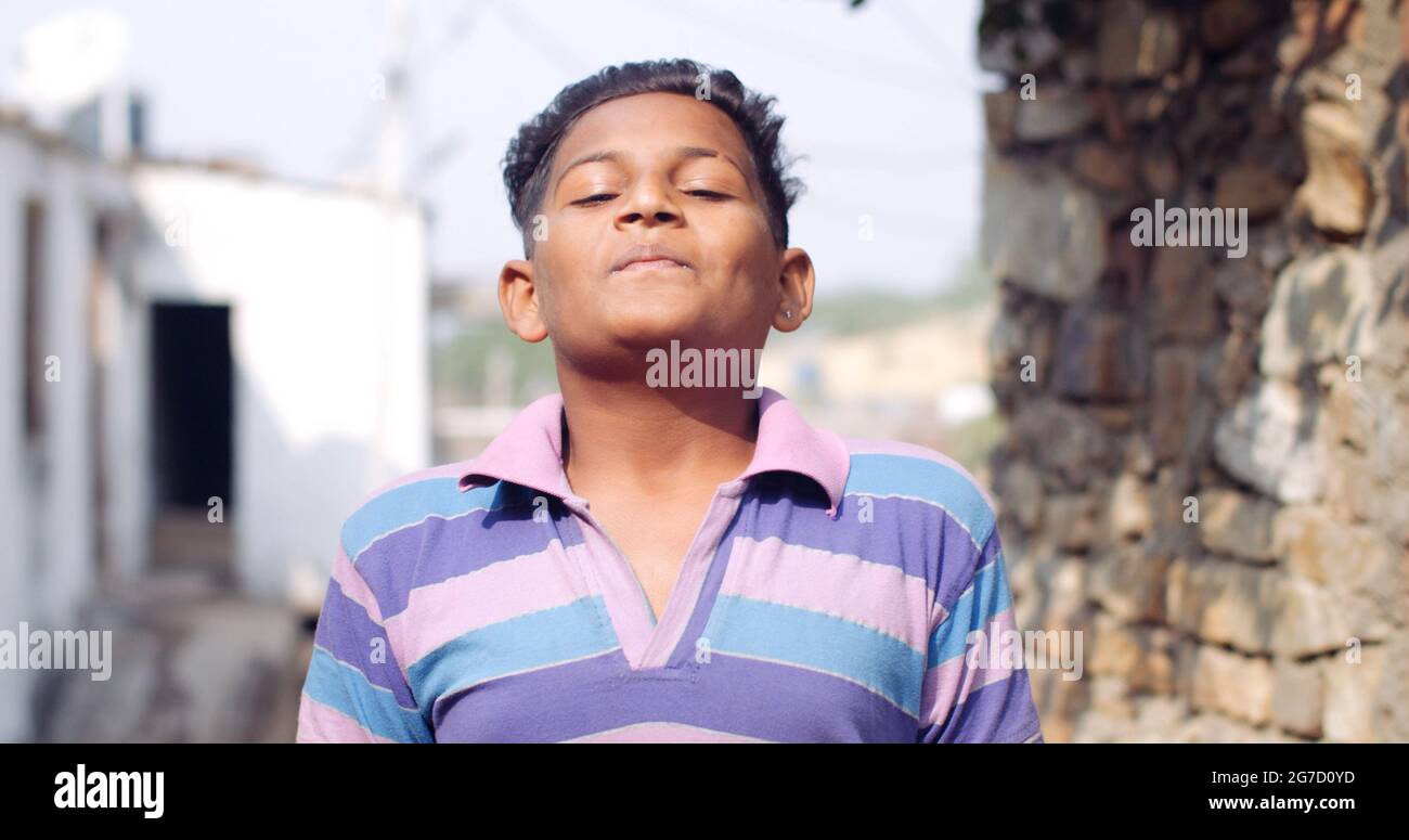 Shallow focus of an Indian boy outdoors Stock Photo - Alamy