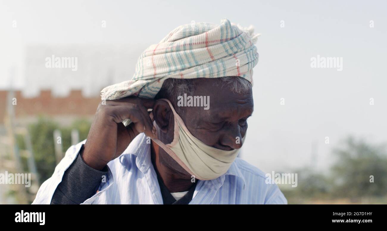 Indian man wearing a face mask- new normal concept Stock Photo - Alamy