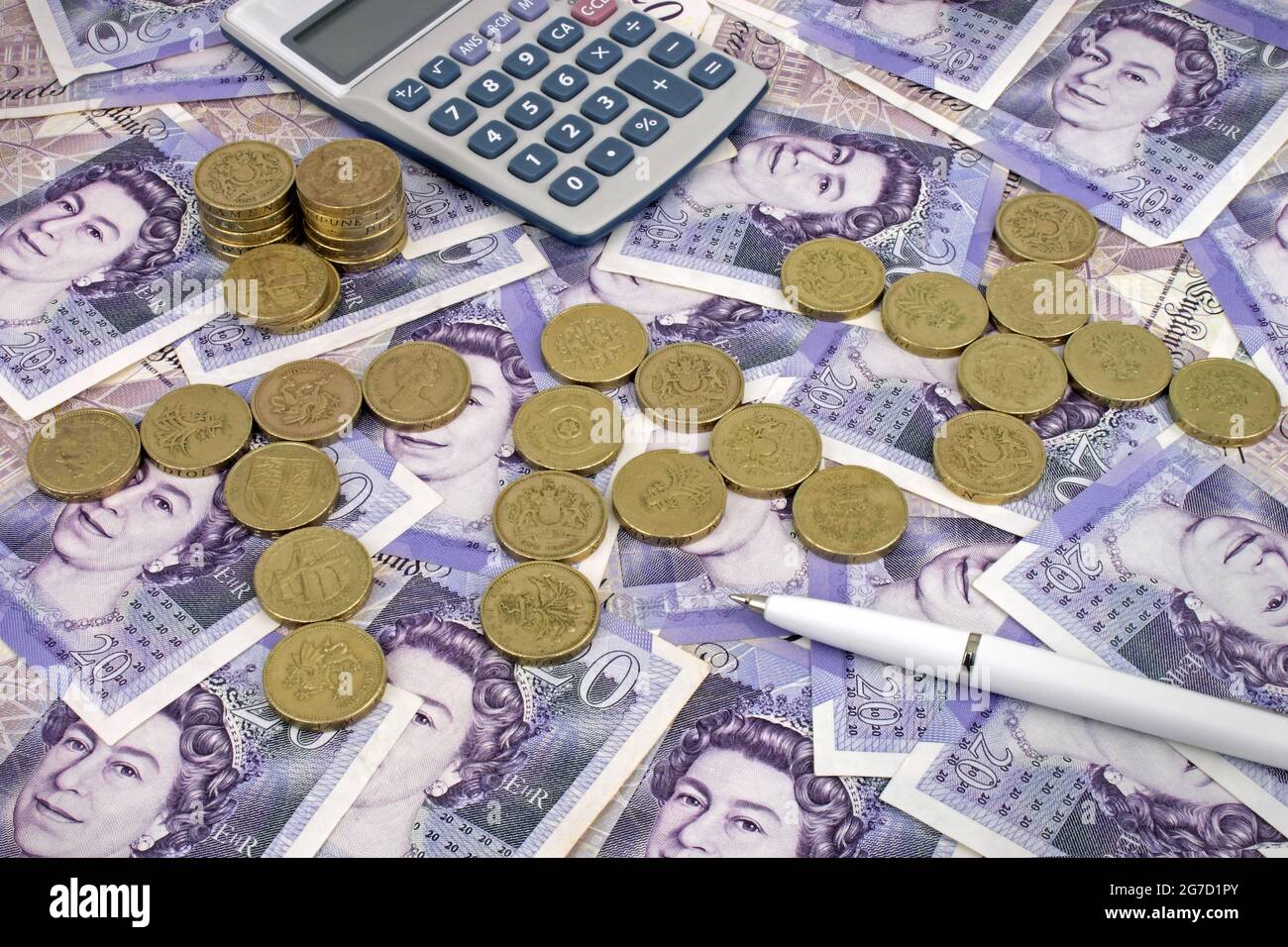 Calculator money cash pound coins hi-res stock photography and images ...