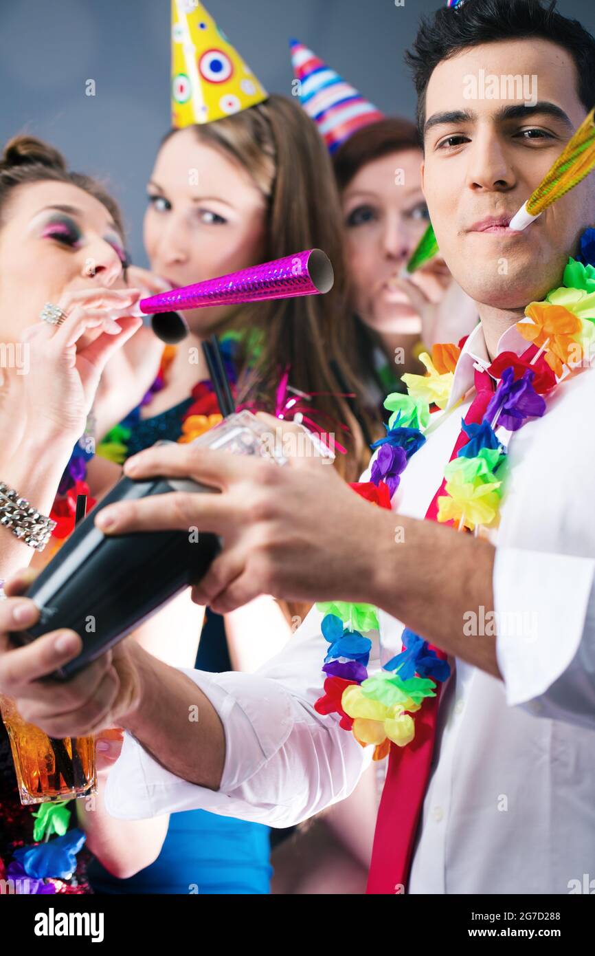 Party People in bar celebrating carnival, group having fun with drinks ...