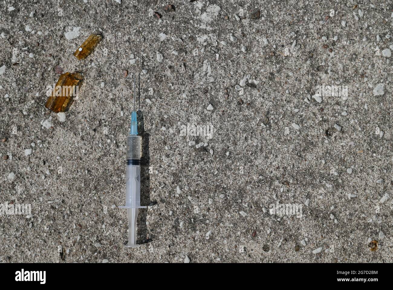 ampoule with injection and syringe on gray stone background Stock Photo ...