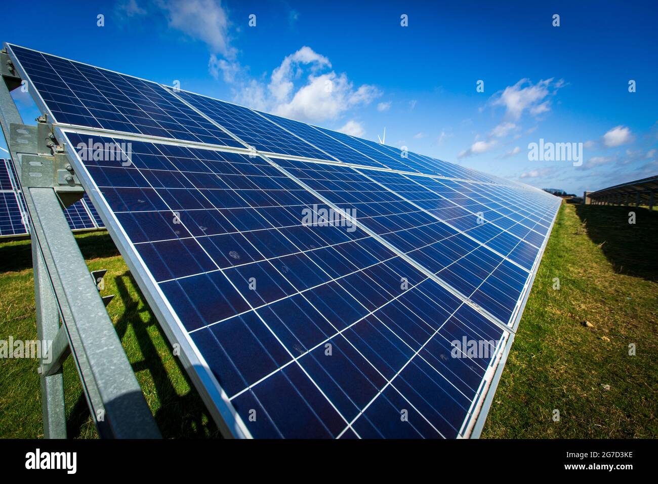 Solar panels and wind turbines at the Chelveston Renewable Energy Park ...