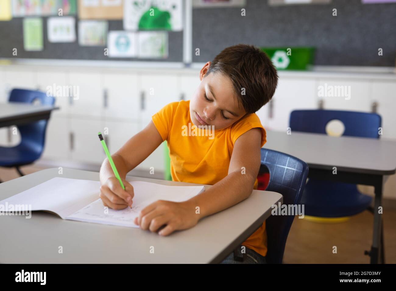 School boy at school desk hi-res stock photography and images - Alamy