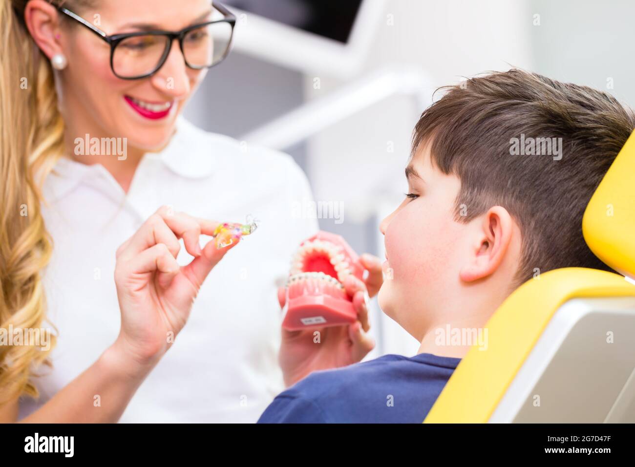 Boy with orthodontics braces hi-res stock photography and images - Alamy