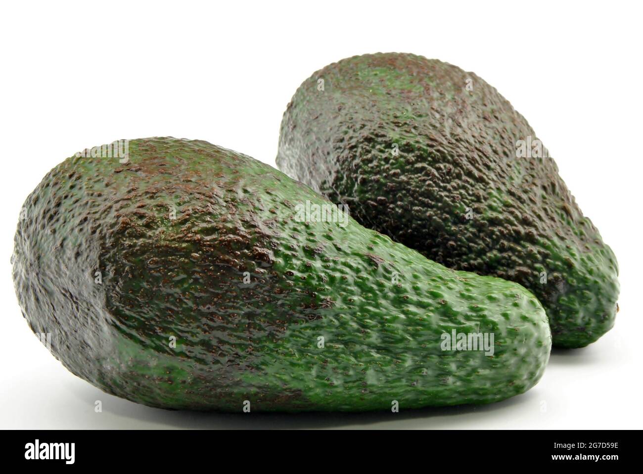 Top view of two avocados with peels isolated on a white background ...