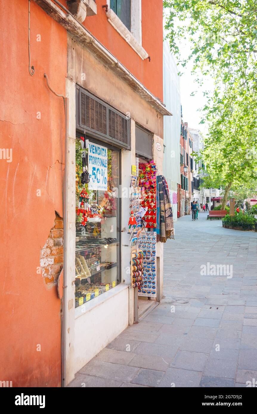 VENICE, ITALY - May 02, 2016: The entrance of a gift shop with signage ...