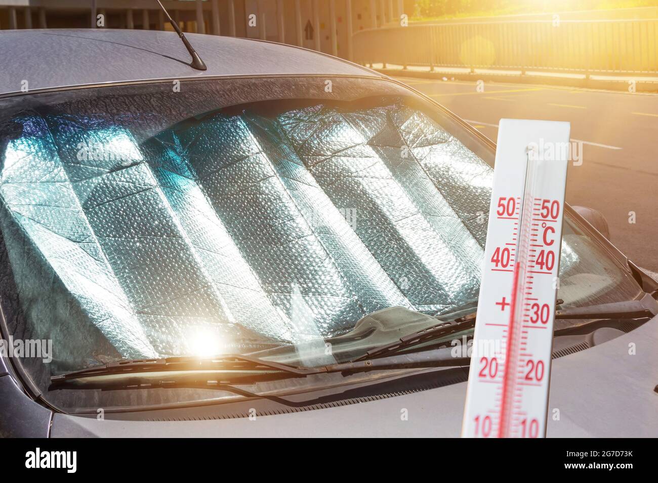 Protective reflective surface under the windshield of the passenger car ...