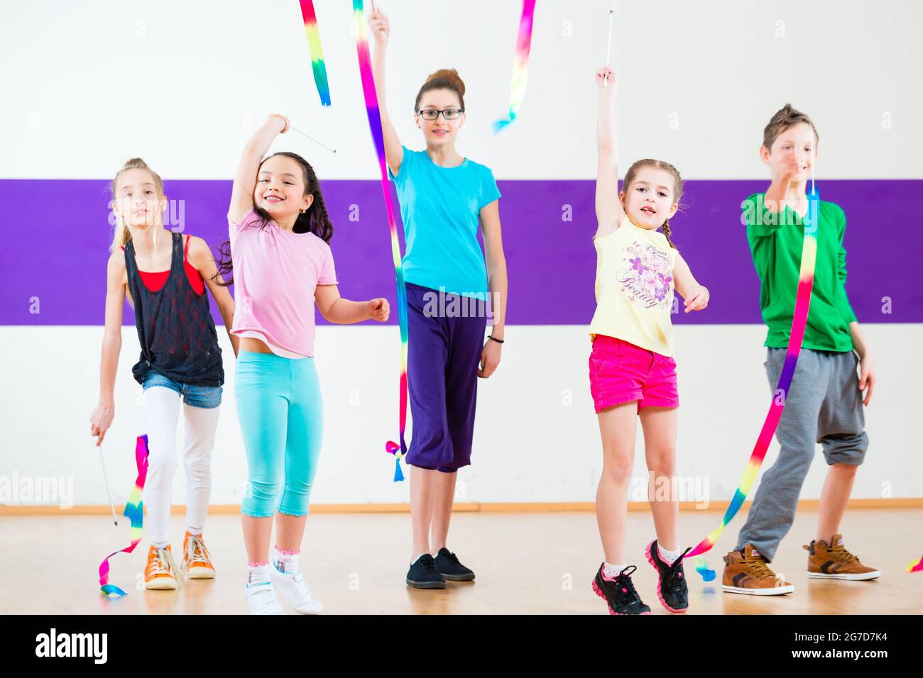 Children dancing modern group choreography with scarfs Stock Photo - Alamy