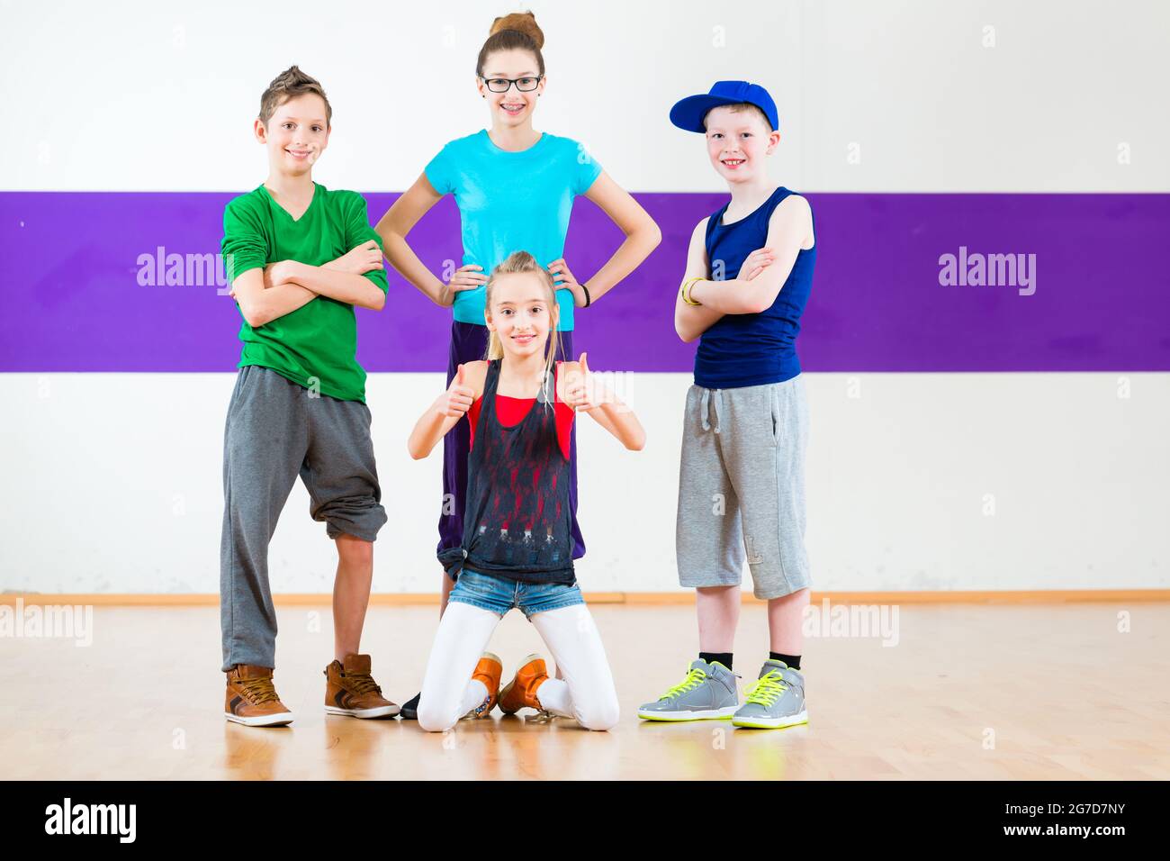 Children dancing modern zumba group choreography in dance class Stock ...