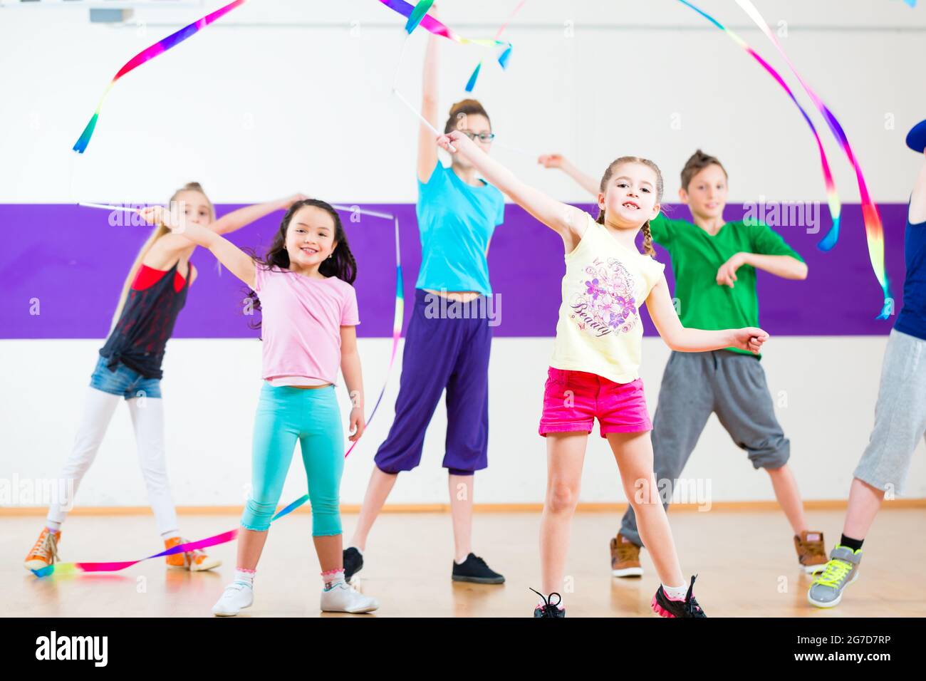 Children dancing modern group choreography with scarfs Stock Photo - Alamy