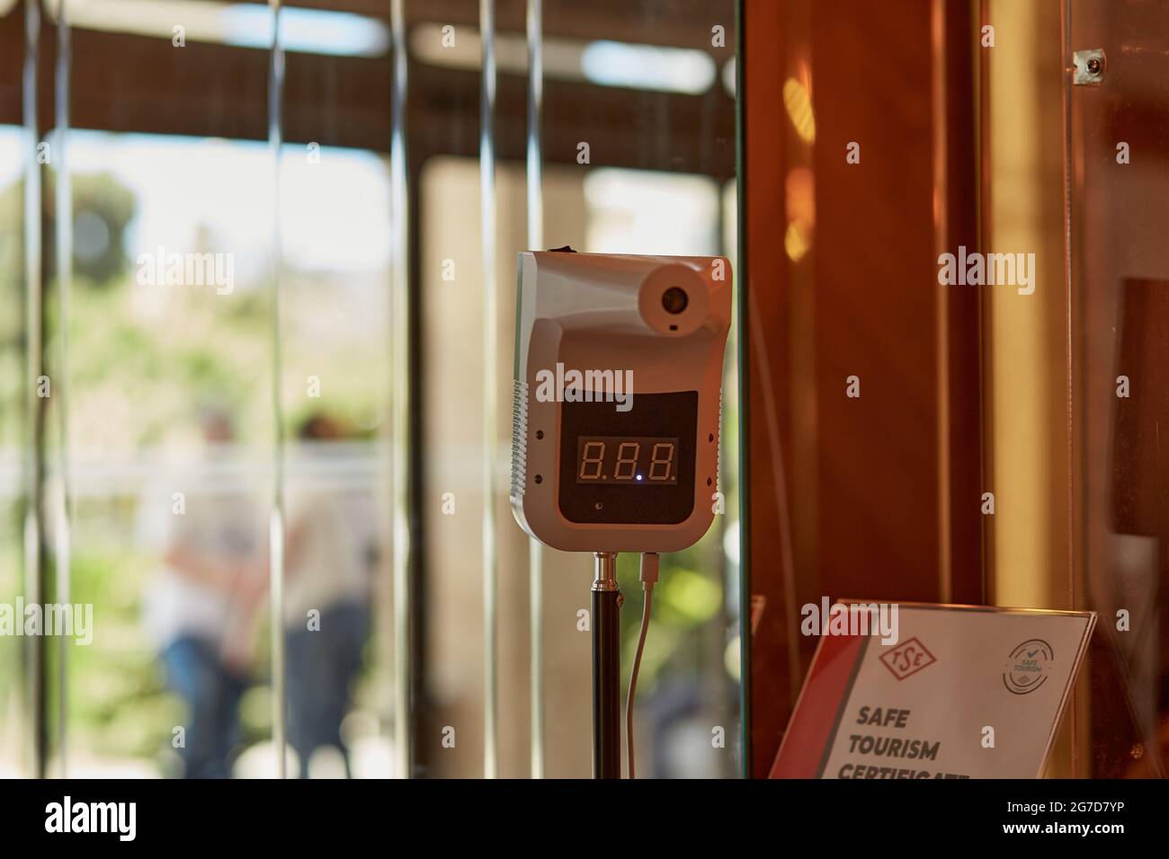 Temperature measuring devicein the hotel lobby. Save tourism concept ...