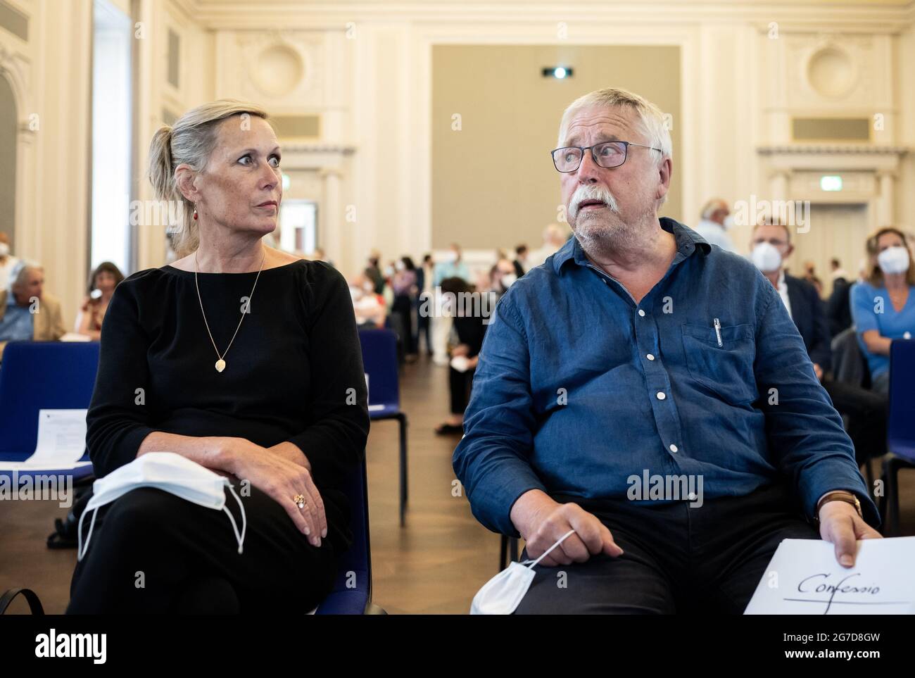13 July 2021, Berlin: Wolf Biermann and his wife Pamela Biermann sit at ...
