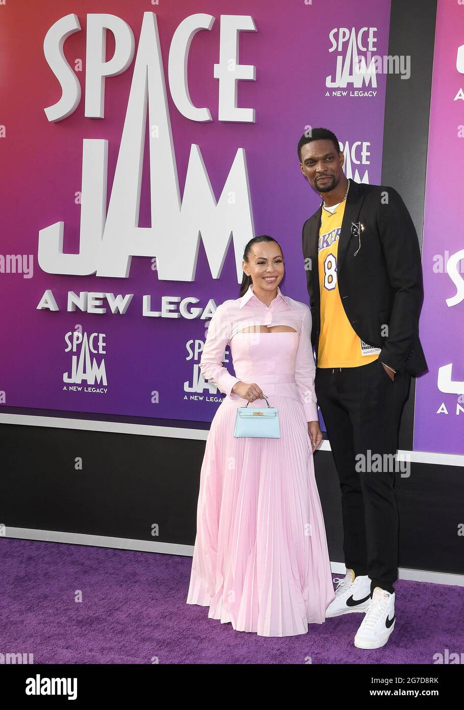 (L-R) Adrienne Bosh and Chris Bosh arrives at the SPACE JAM: A NEW ...