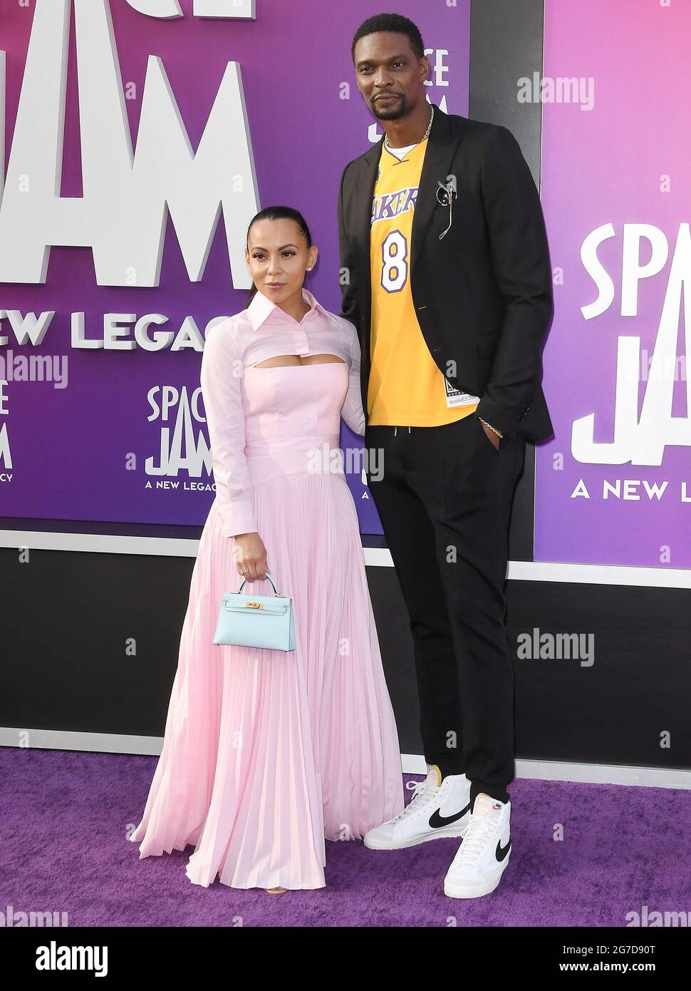 (L-R) Adrienne Bosh and Chris Bosh arrives at the SPACE JAM: A NEW ...