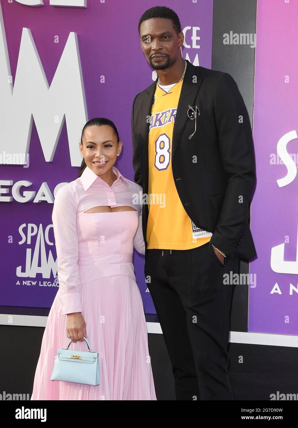 (L-R) Adrienne Bosh and Chris Bosh arrives at the SPACE JAM: A NEW ...